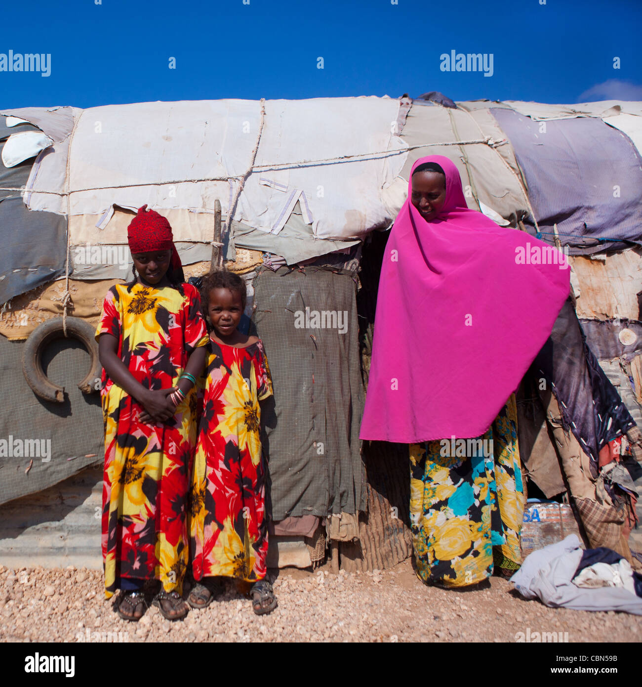 Mother And Two Teenage Girls Outside Slum Hut In Baligubadle Somaliland ...