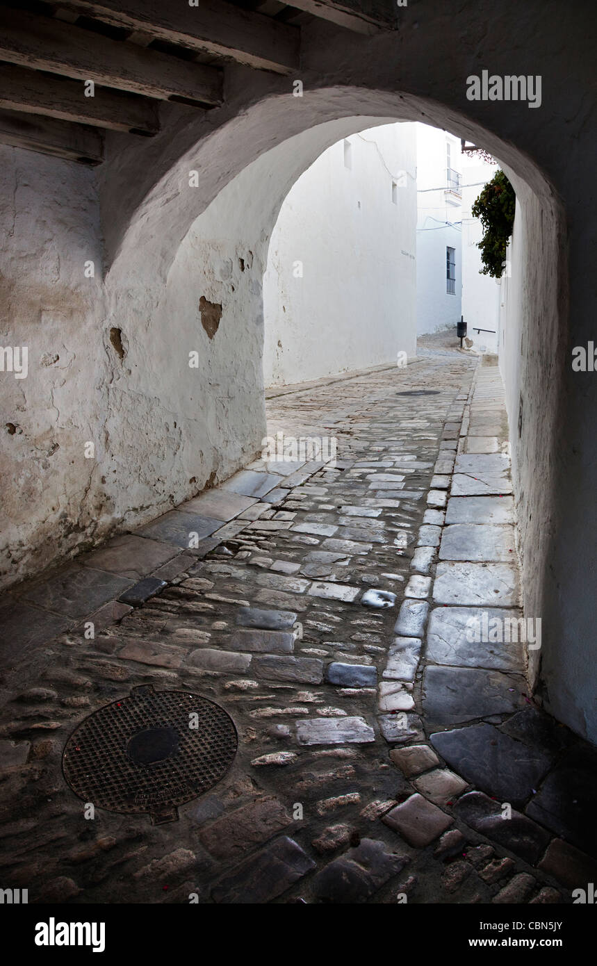 Arc of a street in a Spanish village Stock Photo - Alamy