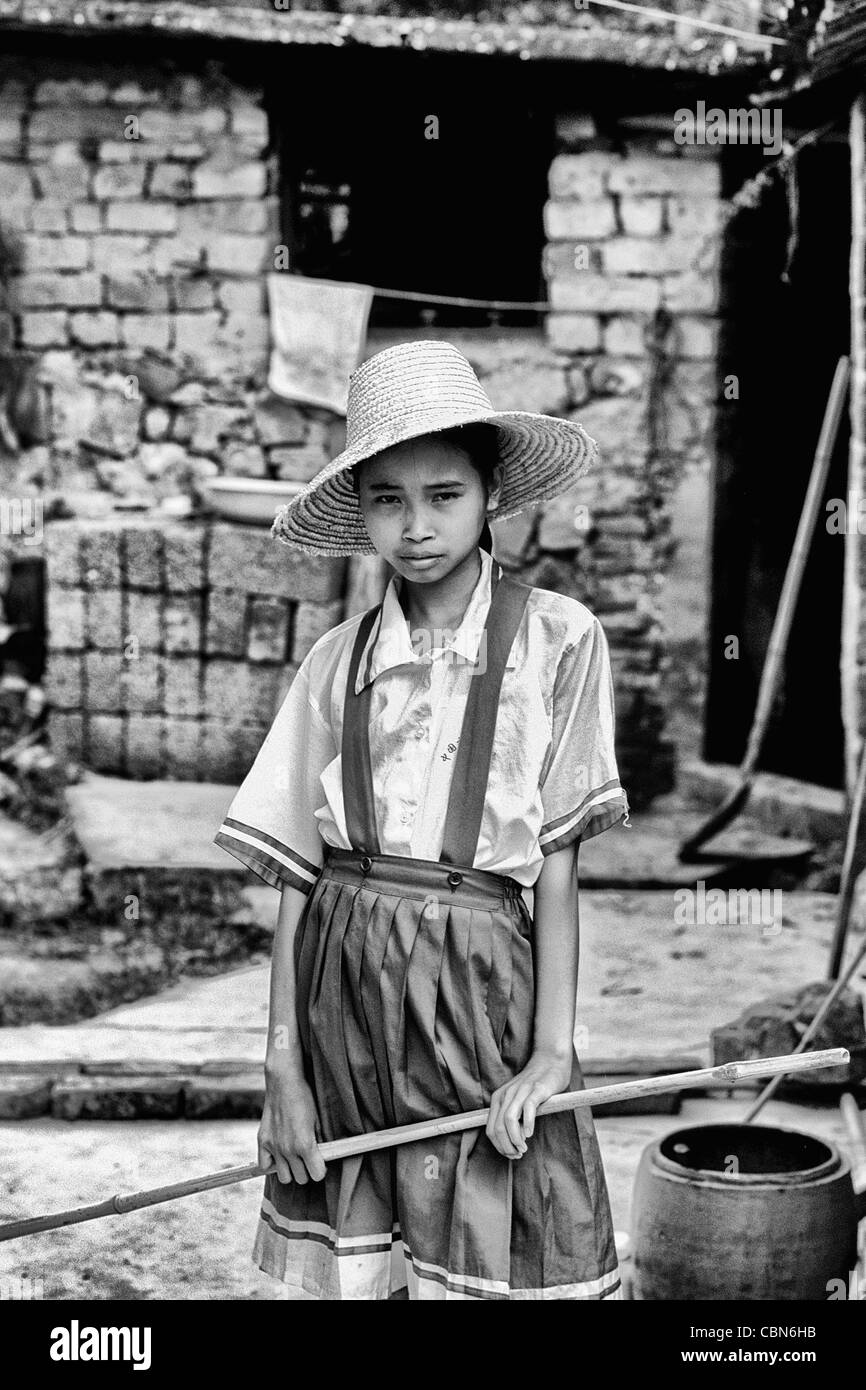 Portrait of poor girl at home in Guilin China Stock Photo - Alamy