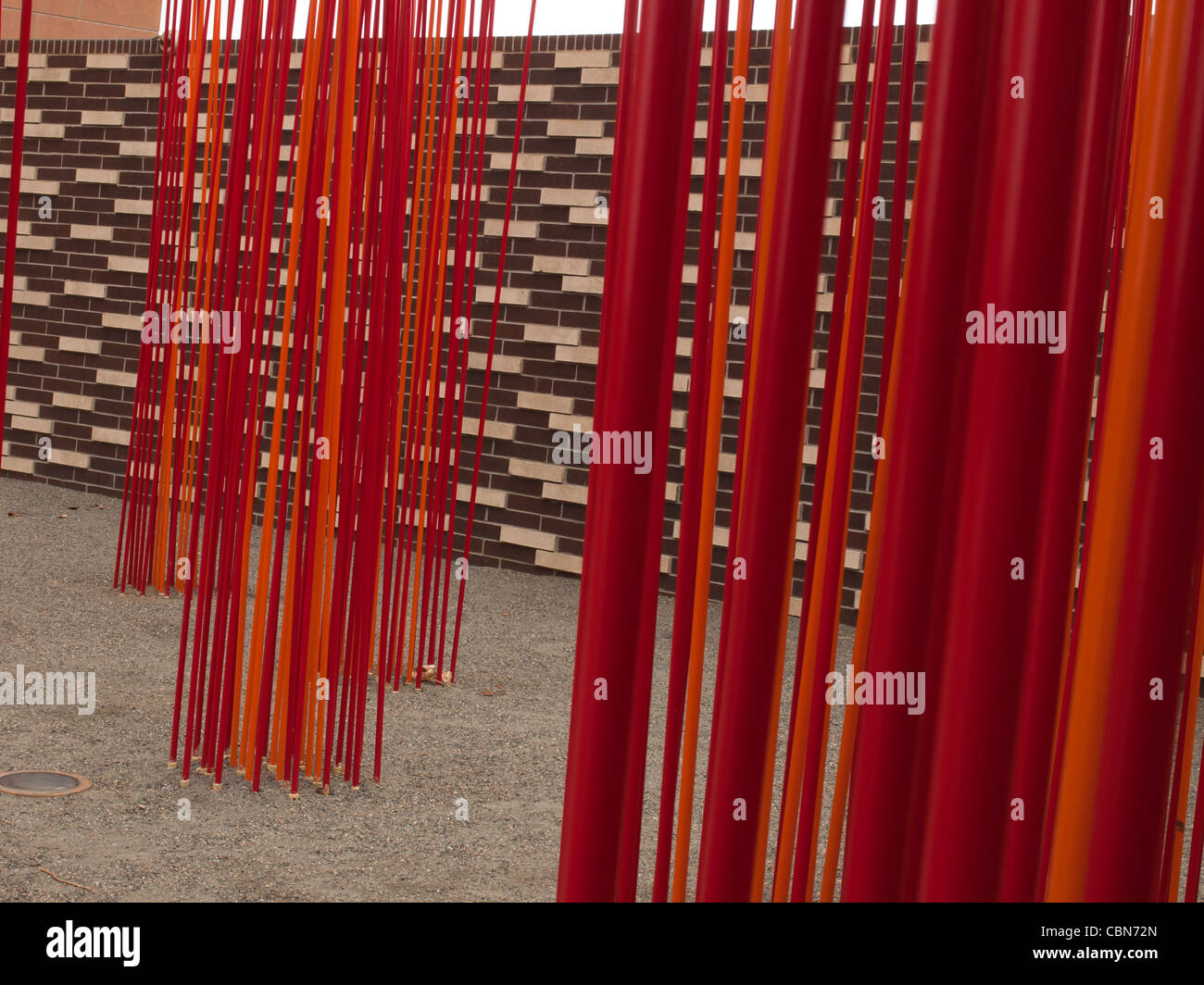 Red modern sculpture in the city Stock Photo - Alamy