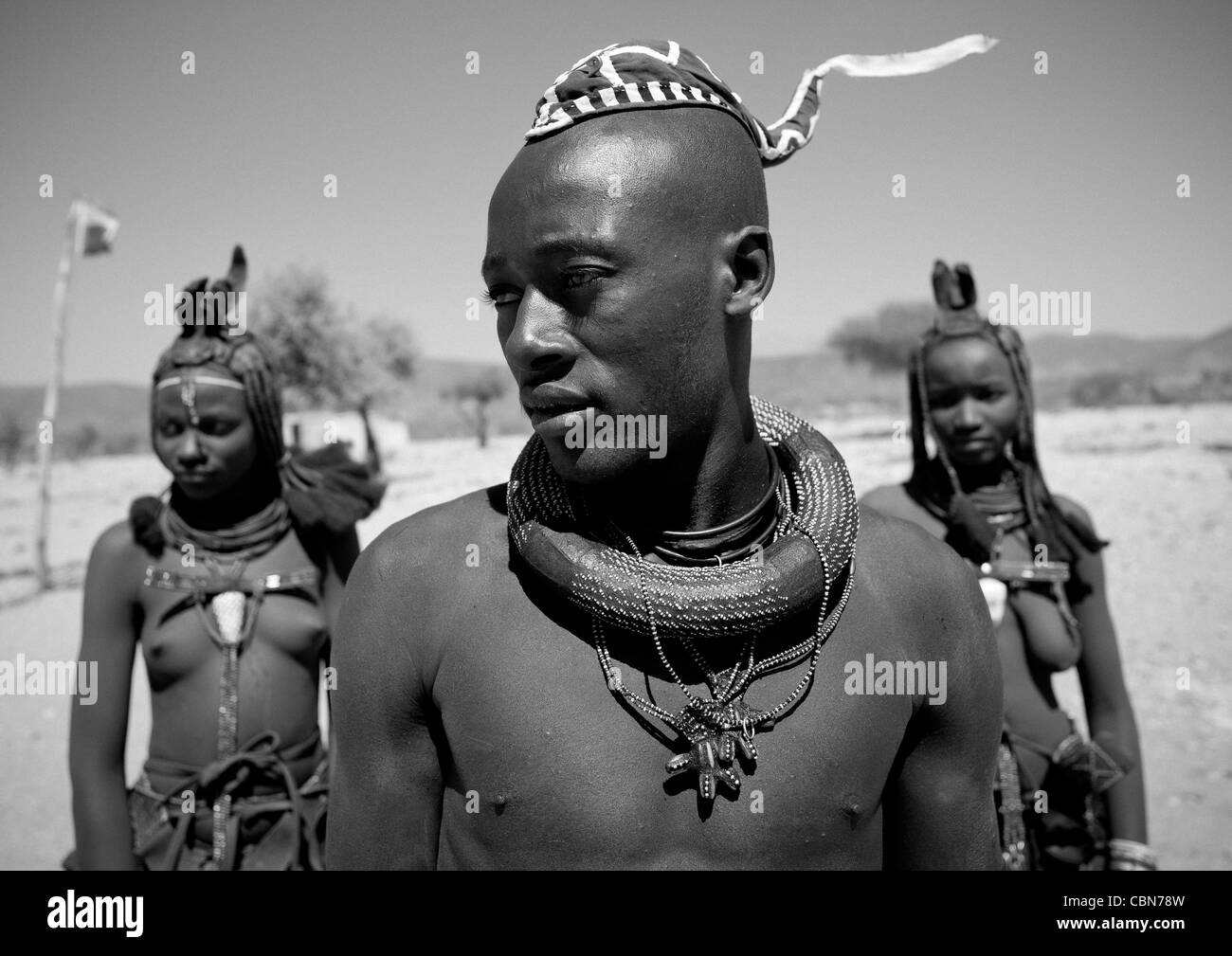 Himba Family In Front Of Their Hut, Angola Stock Photo - Alamy
