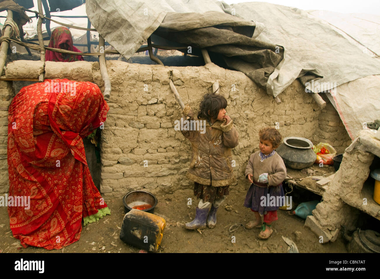 Afghan women and children living in poverty in Kabul Afghanistan Stock ...