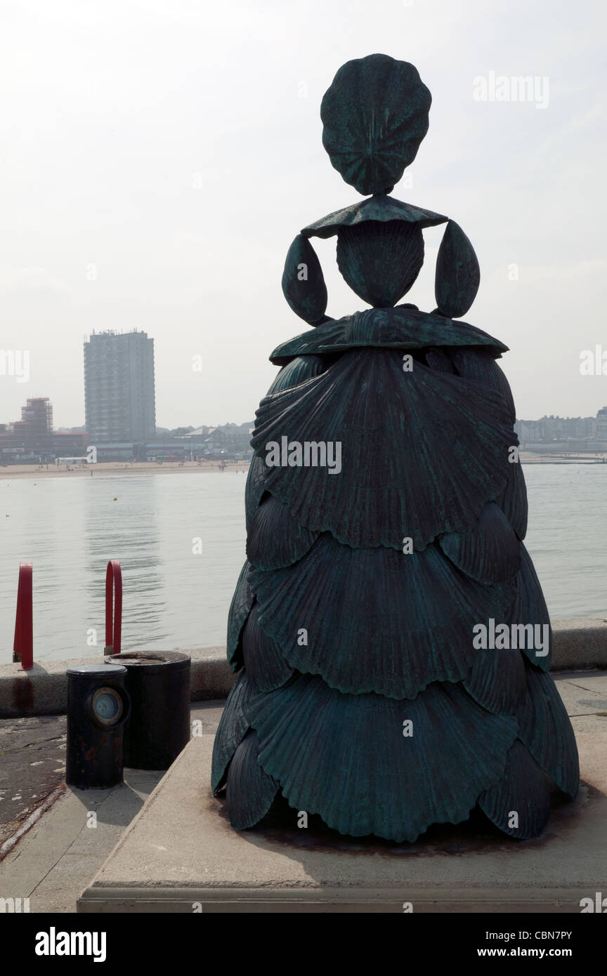 Silhouetted image of Mrs Booth, The shell Lady of Margate, a bronze ...