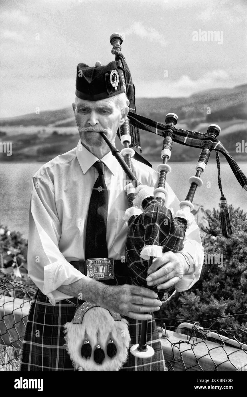 Colorful outfit and personality of bag pipe player at the Loch Ness ...