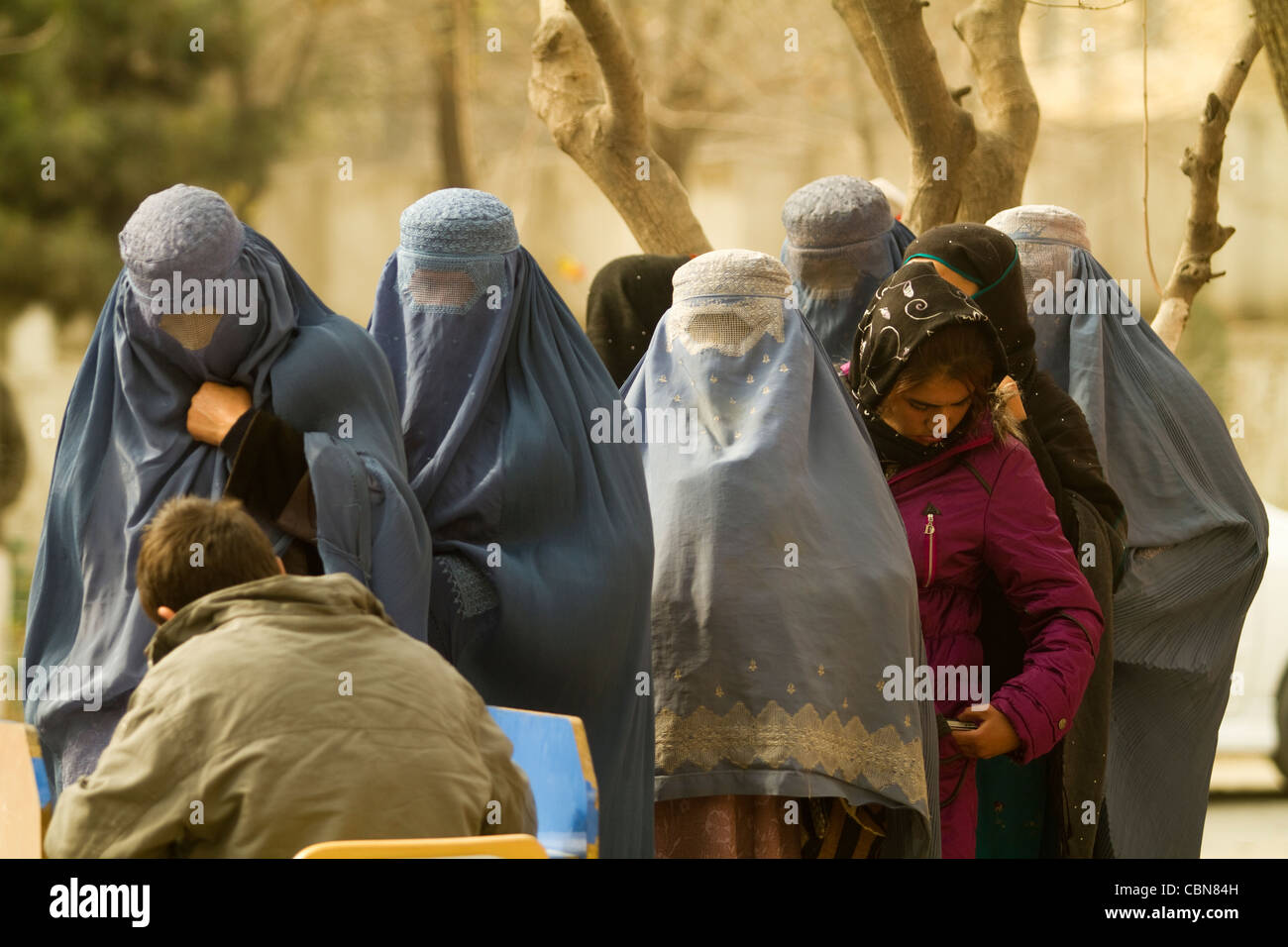 Women in burqa waiting aid for Feast of Sacrifice Kabul Afghanistan ...