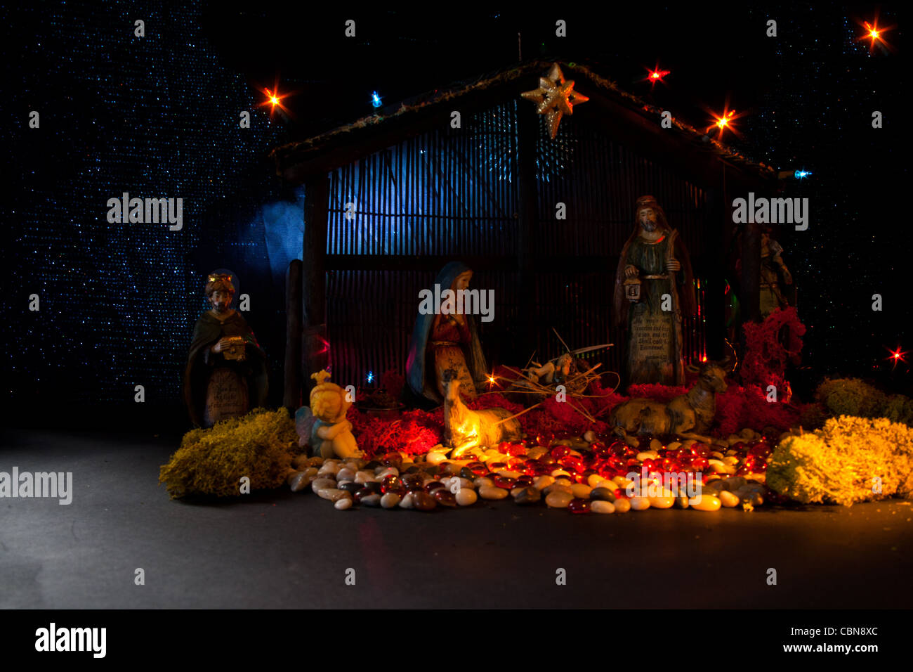 Colorfully lit Nativity Scene for the holidays Stock Photo - Alamy