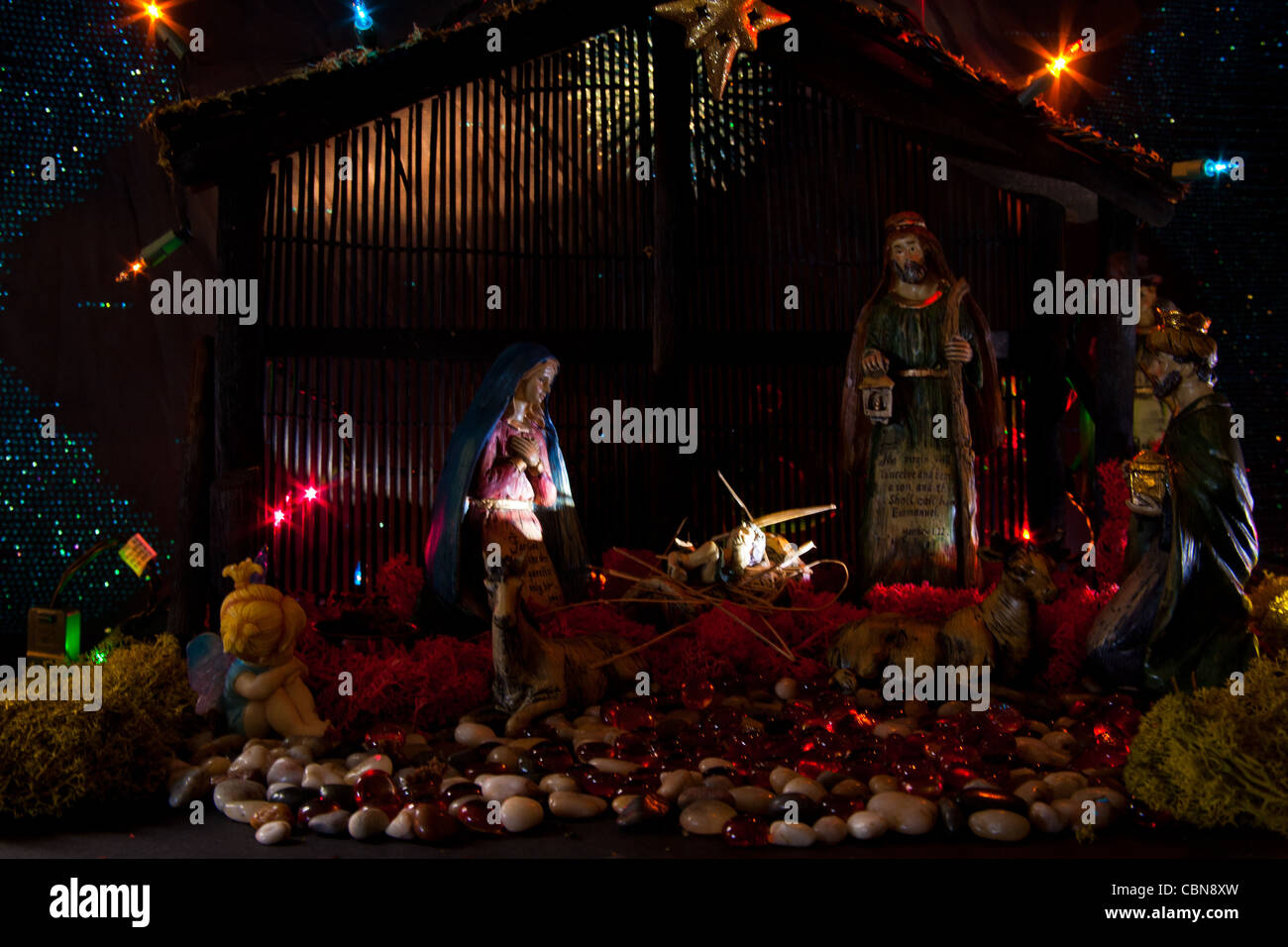 Colorfully lit Nativity Scene for the holidays Stock Photo - Alamy
