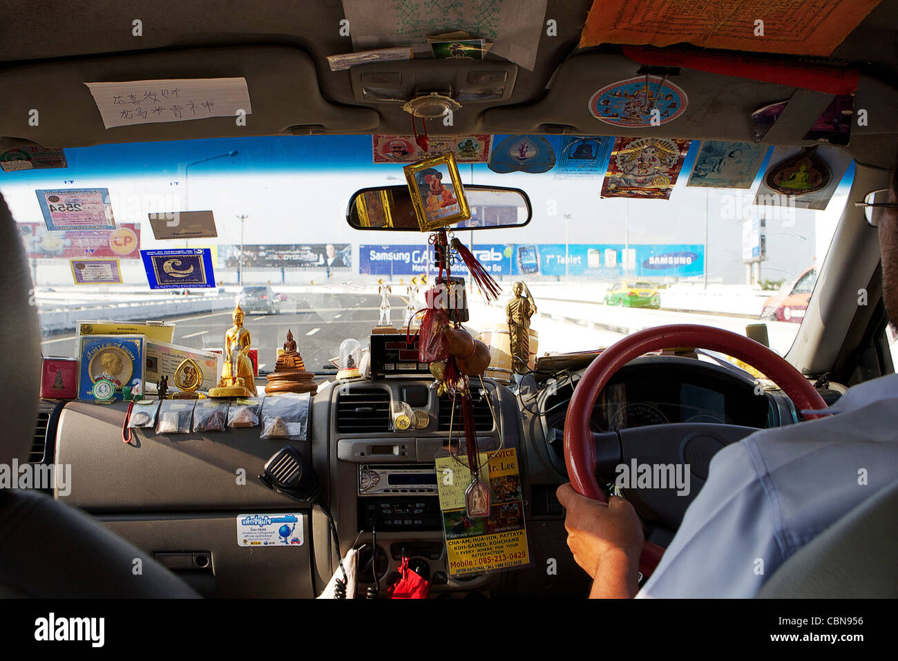 A crowded dash of a taxi in Bangkok, Thailand Stock Photo - Alamy