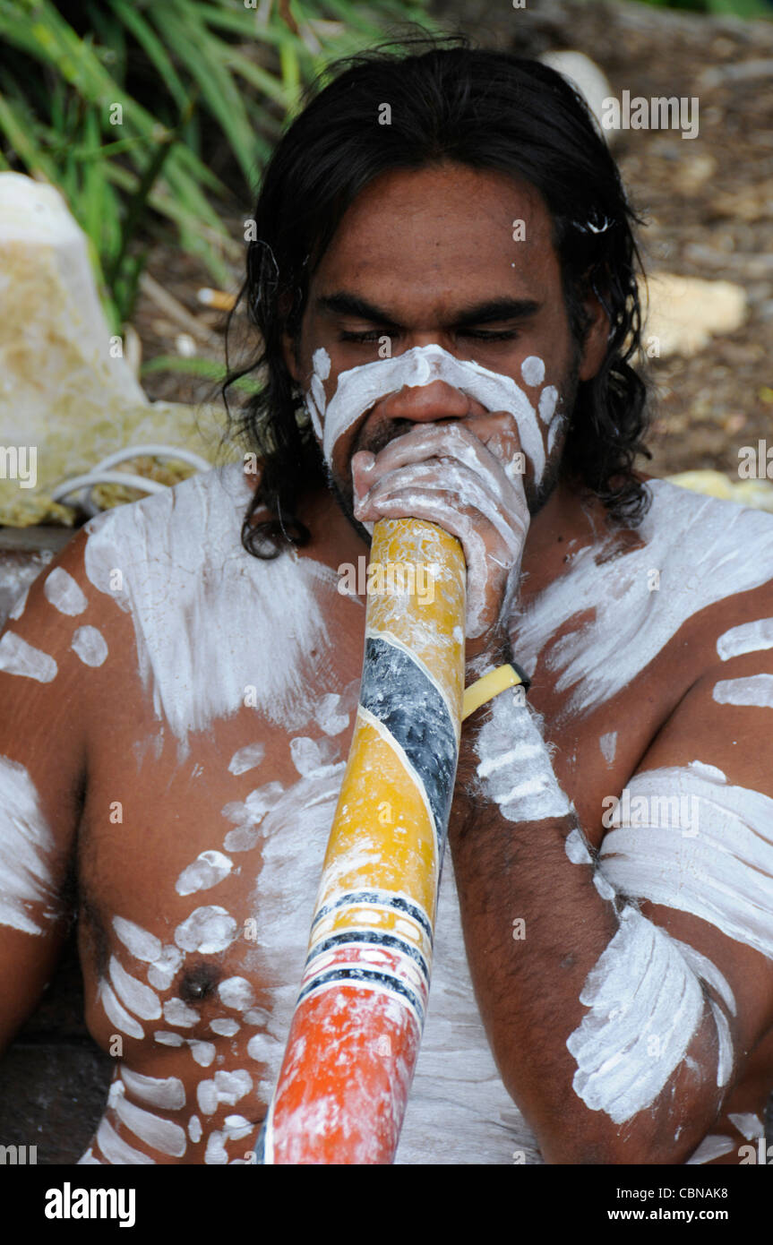 An Aboriginal busker playing his didgeridoo as a tourist attraction on ...