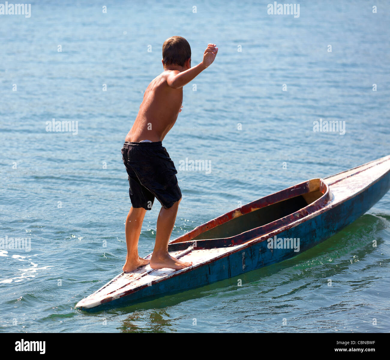 A happy boy on a boat Stock Photo - Alamy