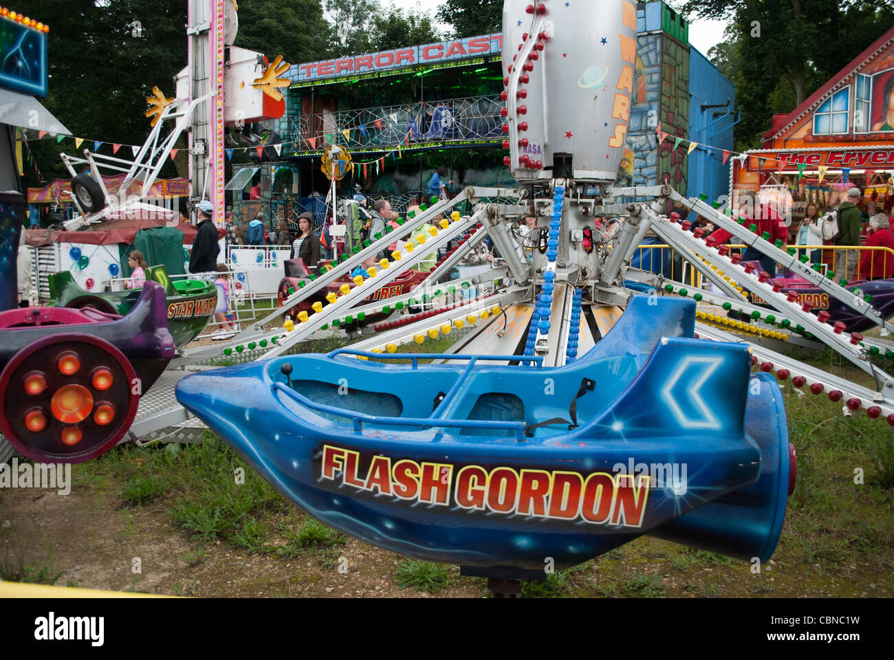 Fairground roundabout Star Wars rocket ride with blue Flash Gordon ...