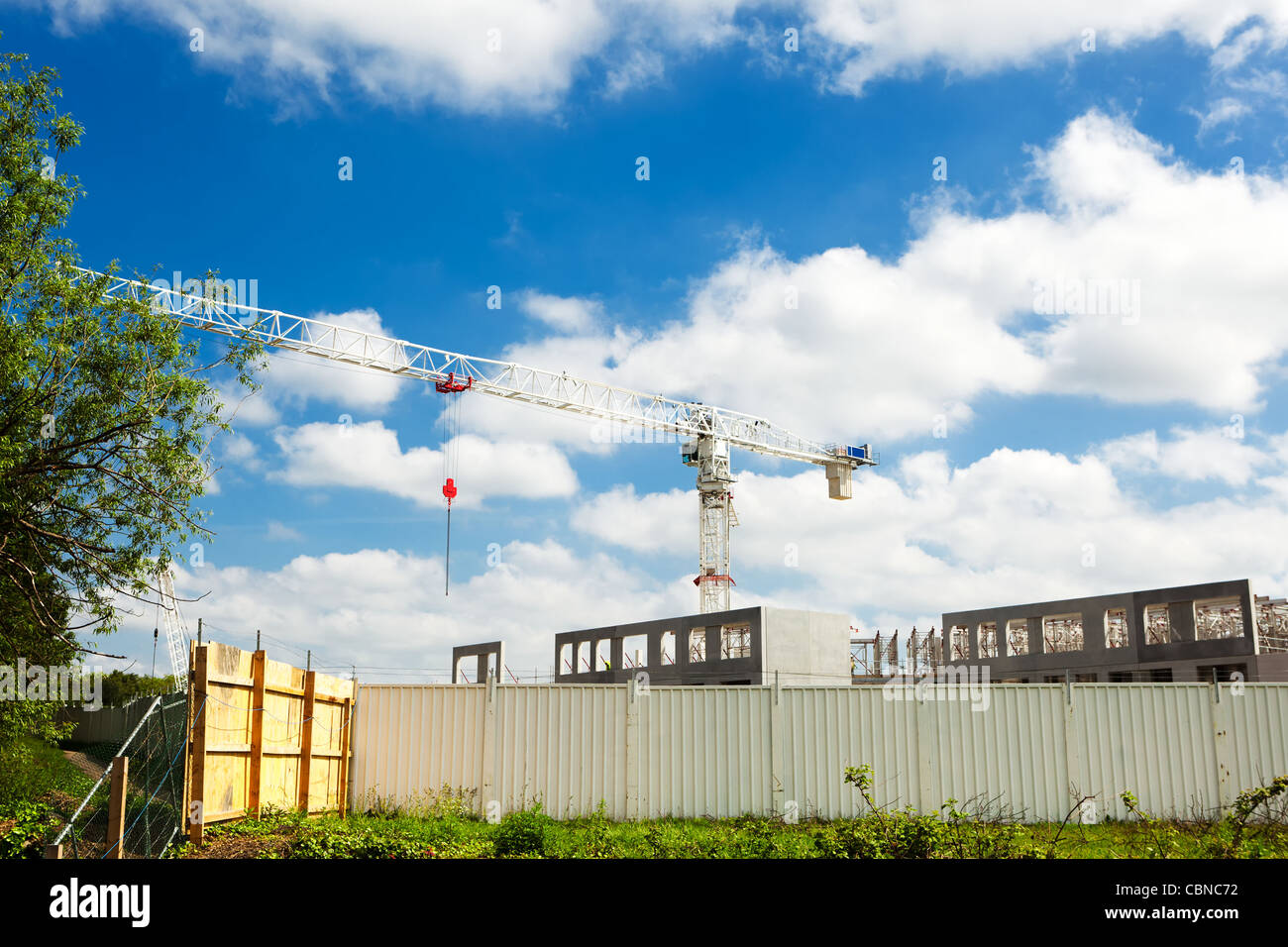 Construction crane and building Stock Photo - Alamy