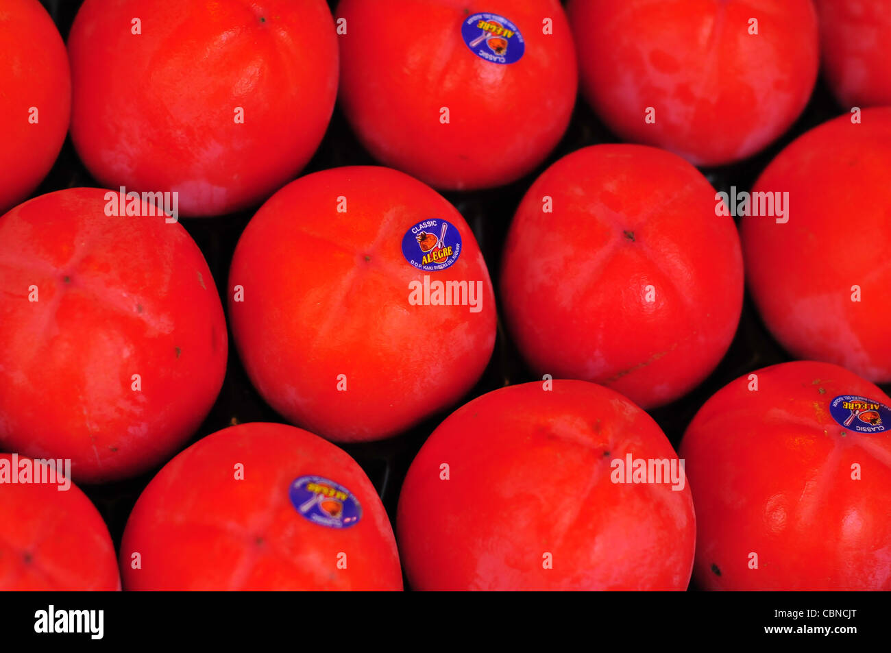 Bright red persimmon hi-res stock photography and images - Alamy