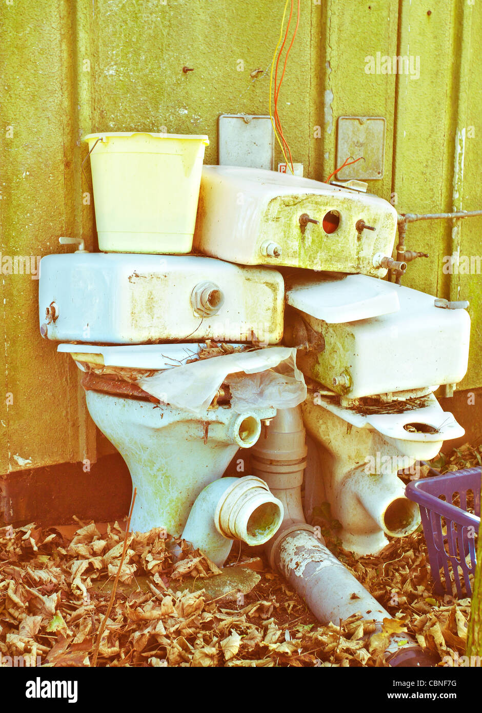 Waste toilets and bathroom items at a scrap yard Stock Photo - Alamy