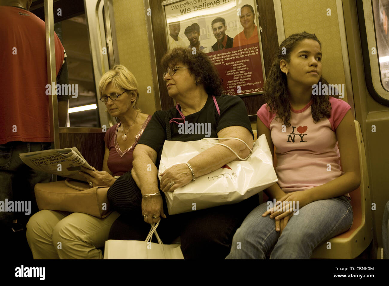 People riding the New York City subway Stock Photo - Alamy