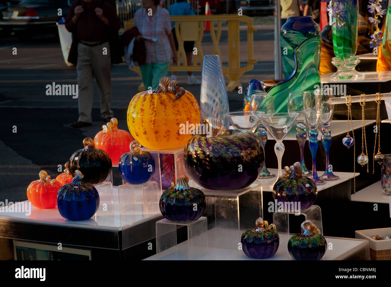 Art glass display at Shrimp Festival in Gulf Shores, AL Stock Photo - Alamy