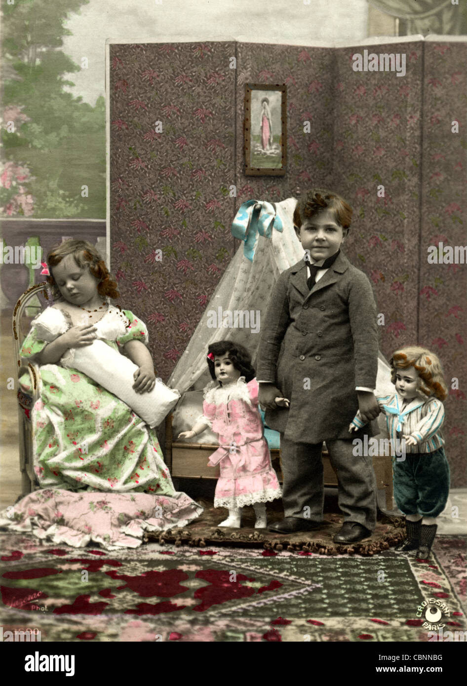 Little Children Mother & Father with Doll Family Stock Photo - Alamy
