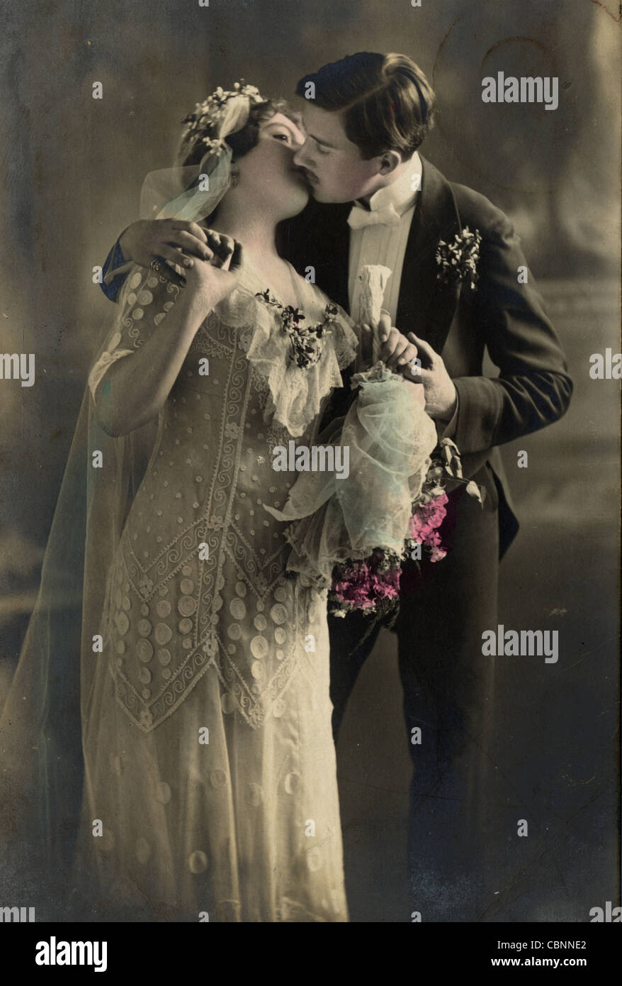 Bride & Groom Kissing Stock Photo - Alamy
