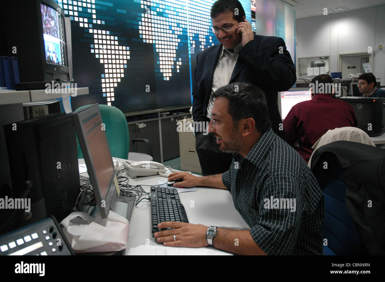 The main newsroom at the arabic Al Jazeera Satellite Channel Stock ...