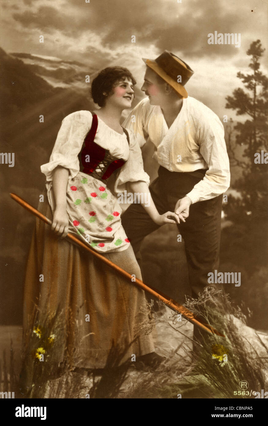 Attractive Young Peasant Couple in the Alps Stock Photo - Alamy