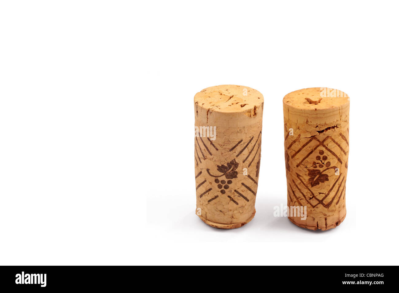 Two isolated corks with white background Stock Photo - Alamy