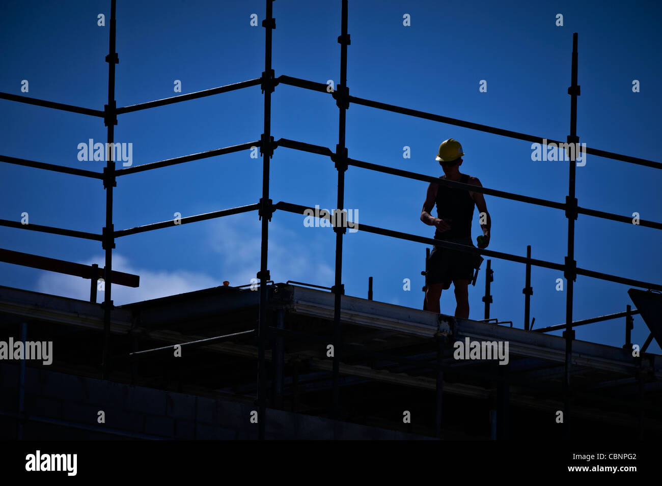 Construction worker on building site Stock Photo - Alamy