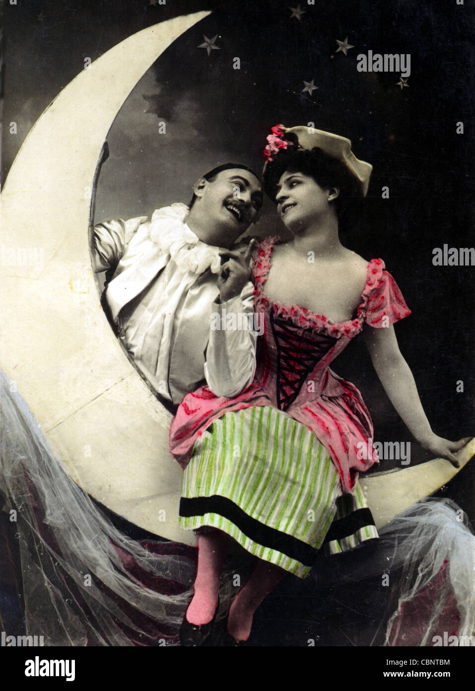 Pagliacci Clown Flirting with Woman on the Moon Stock Photo - Alamy