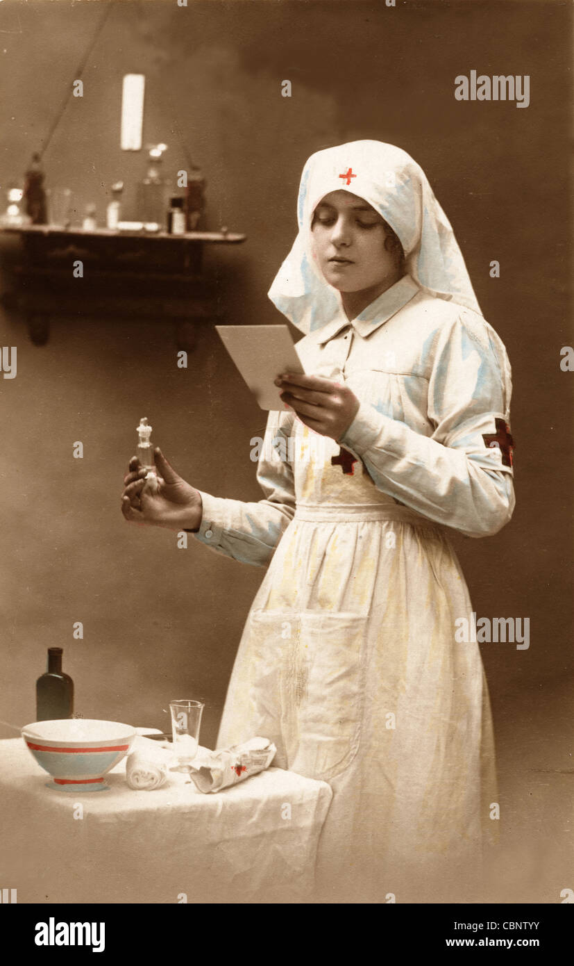 Red Cross Nurse Preparing Medication #3 Stock Photo - Alamy