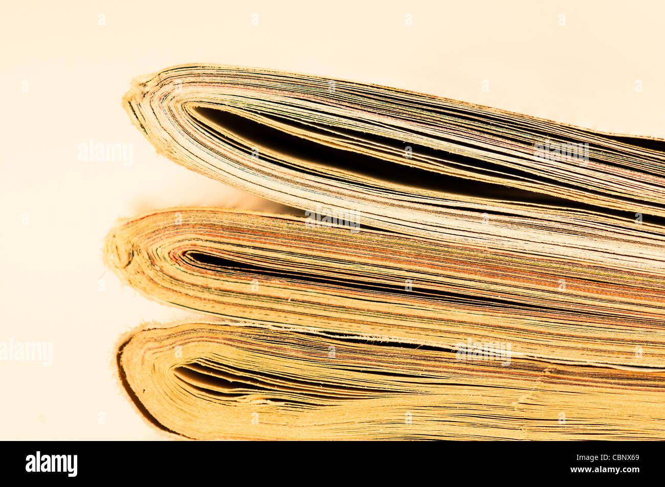 A large stack of magazines piled high Stock Photo - Alamy