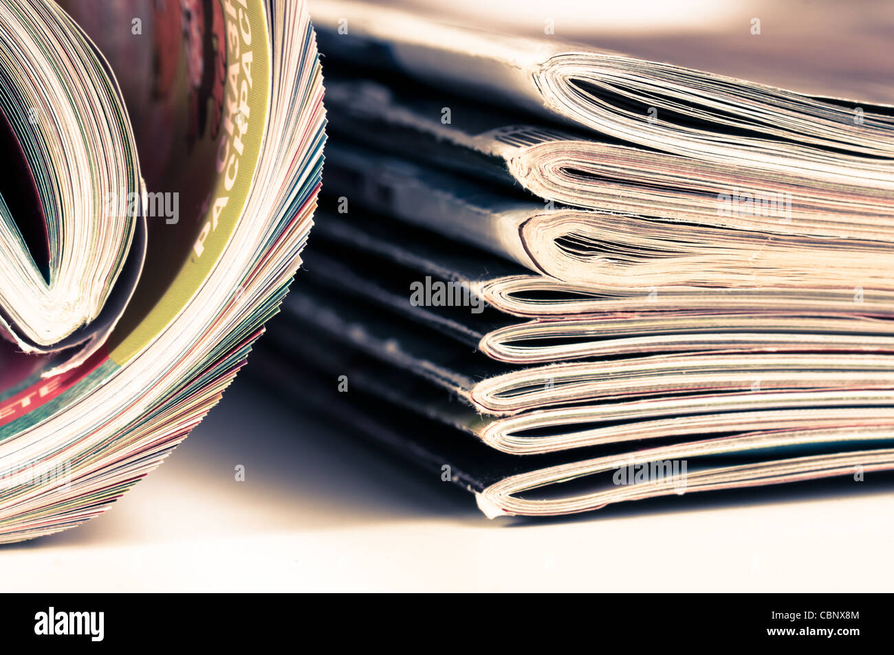 A large stack of magazines piled high Stock Photo - Alamy