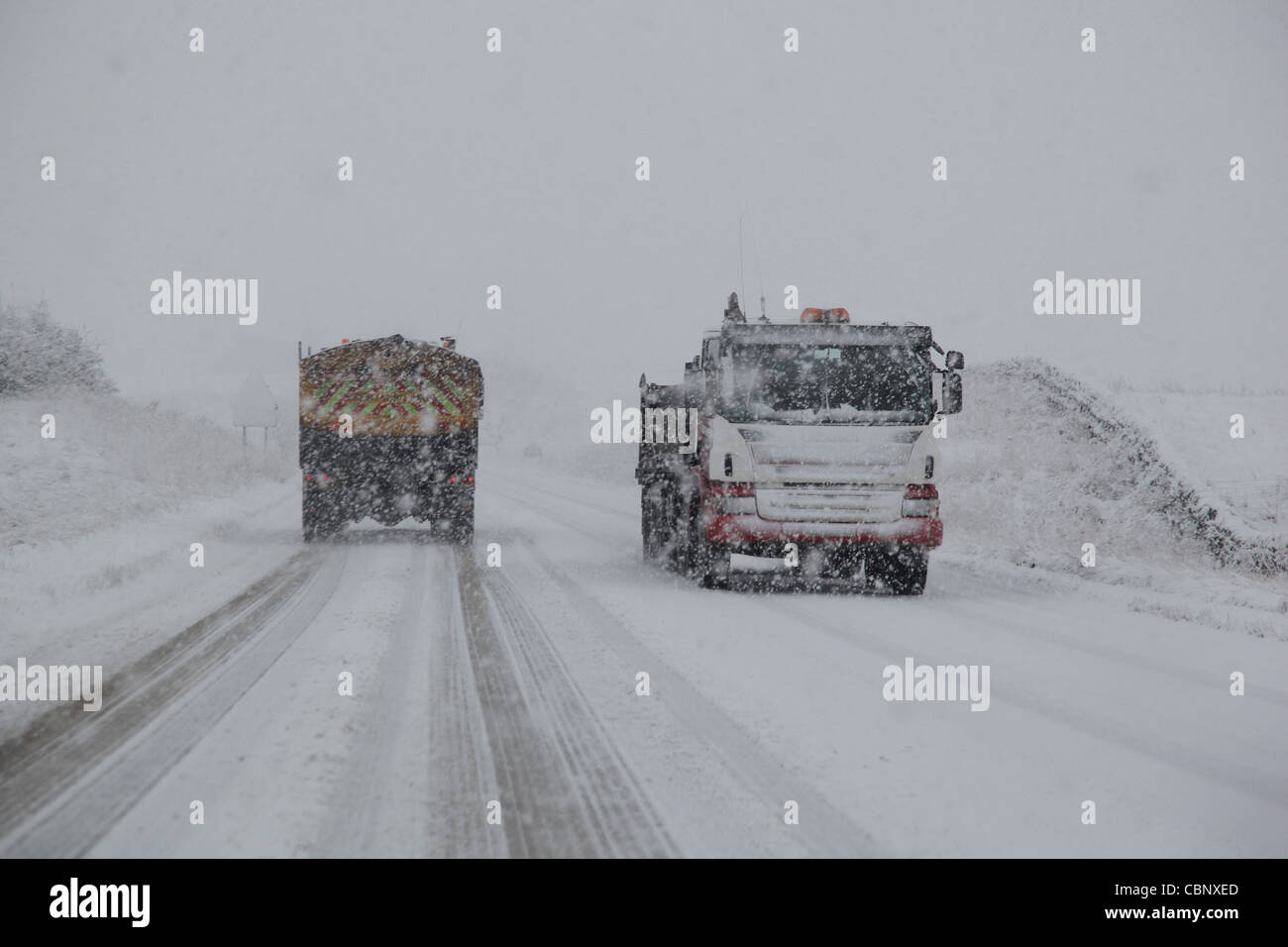 Trucks lorry pass each other on the A68 with snow on the road Stock ...