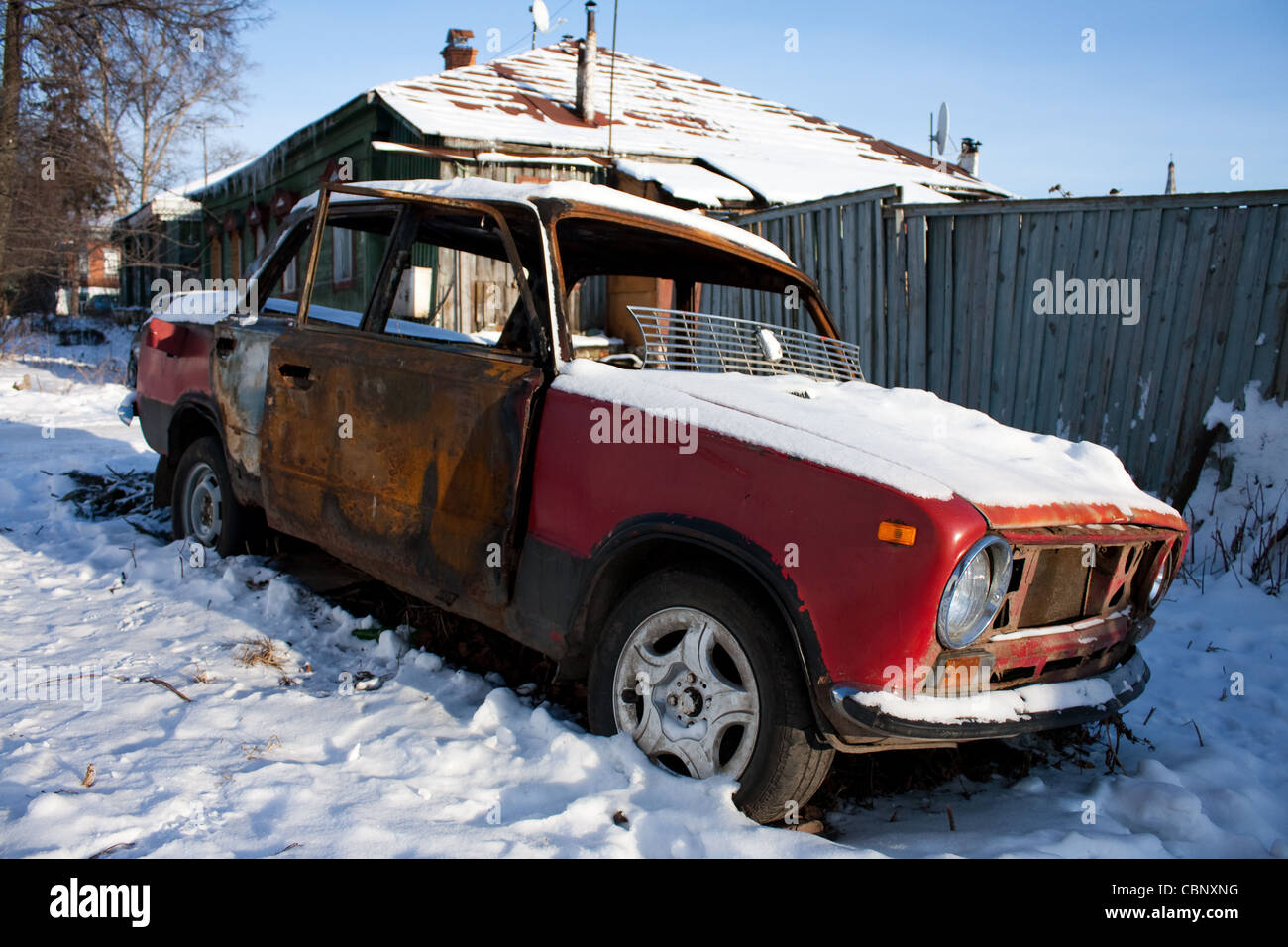 photo of old rusty car covered with snow Stock Photo - Alamy