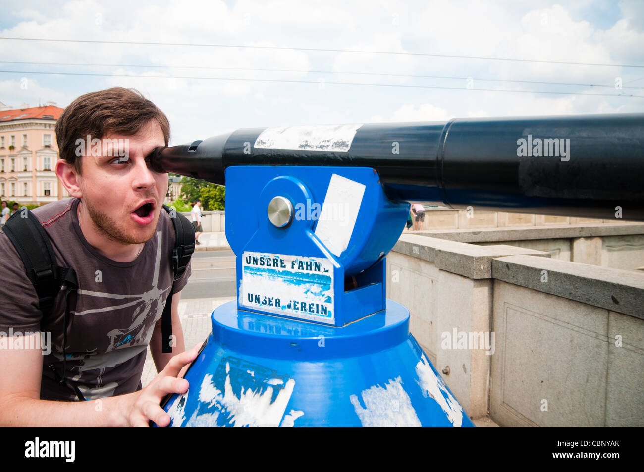Man looks in telescope hi-res stock photography and images - Alamy