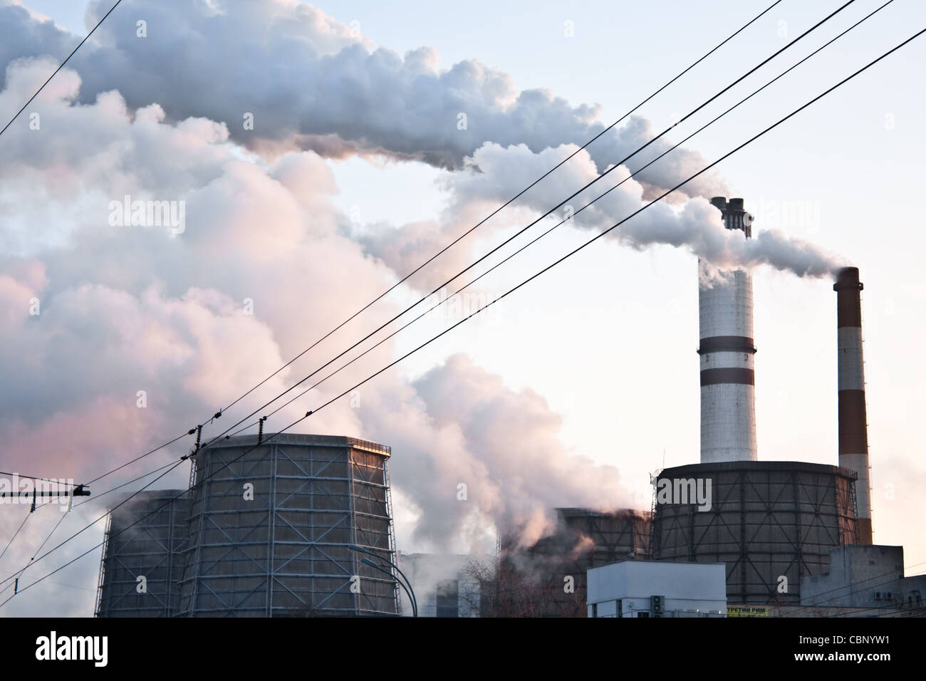 photo of industrial smoking pipes Stock Photo - Alamy
