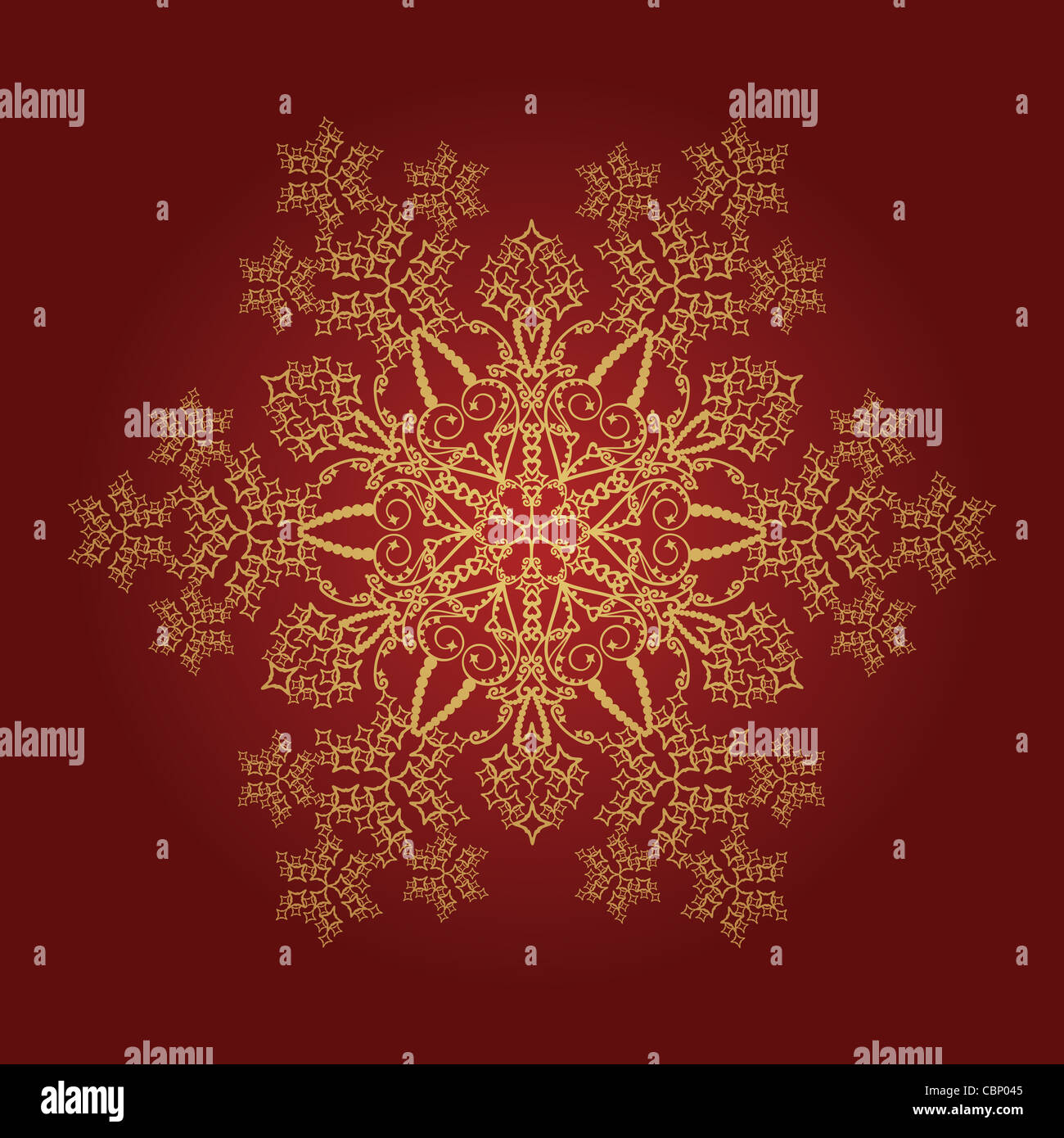 Detailed golden snowflake on red background Stock Photo - Alamy
