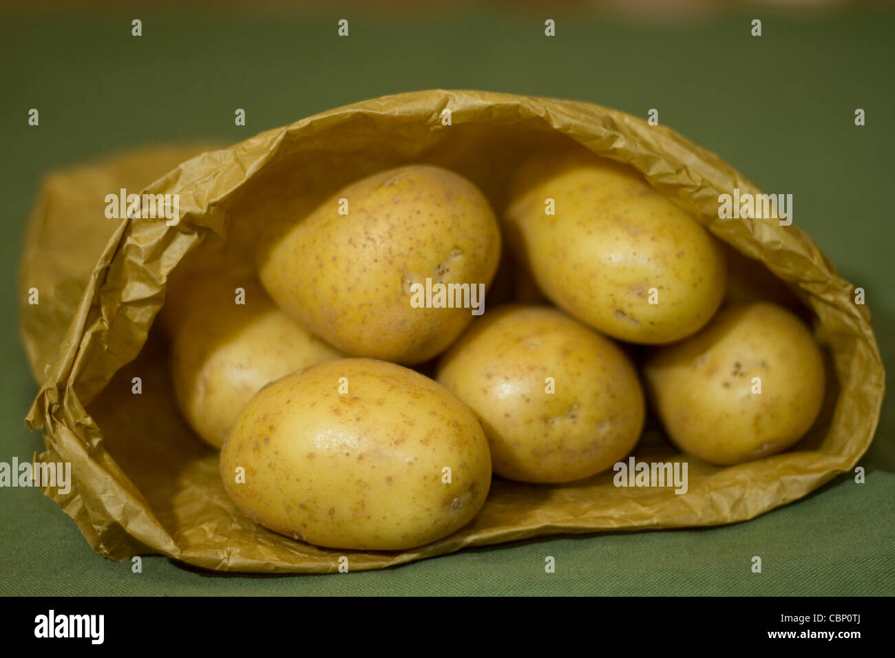 Potatoes in brown paper bag hi-res stock photography and images - Alamy