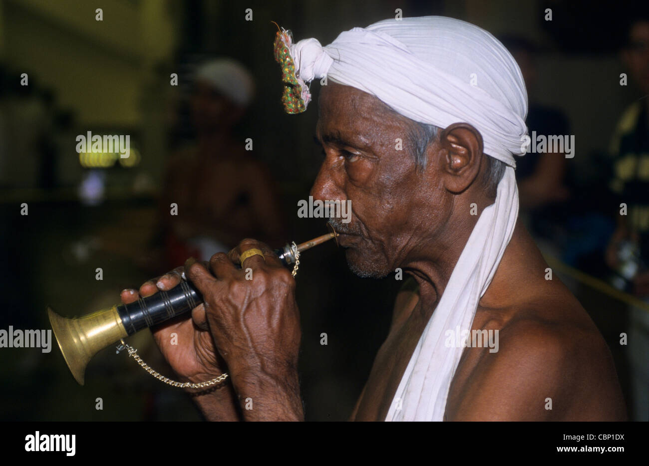 Musician playing trumpet, Temple of the Tooth, Kandy, Sri Lanka Stock ...