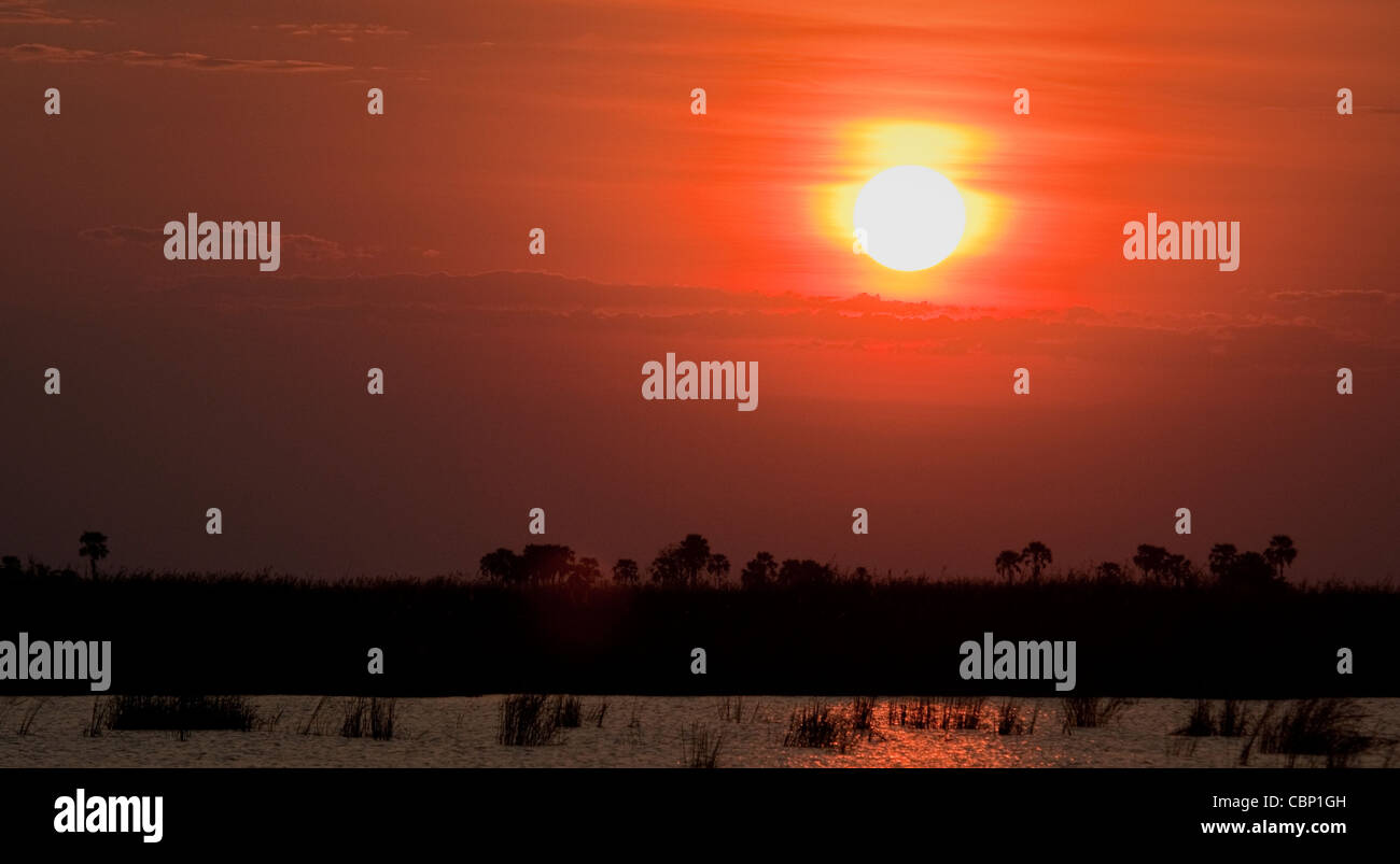 Africa Botswana Sunset over Linyati River, Linyati Reserve Stock Photo ...