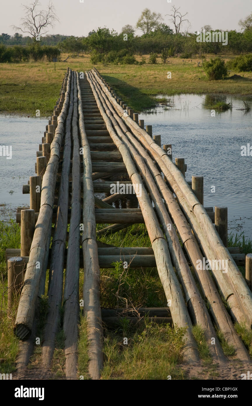 Africa Botswana Linyati Reserve Okavango Delta-Wooden bridge of logs ...