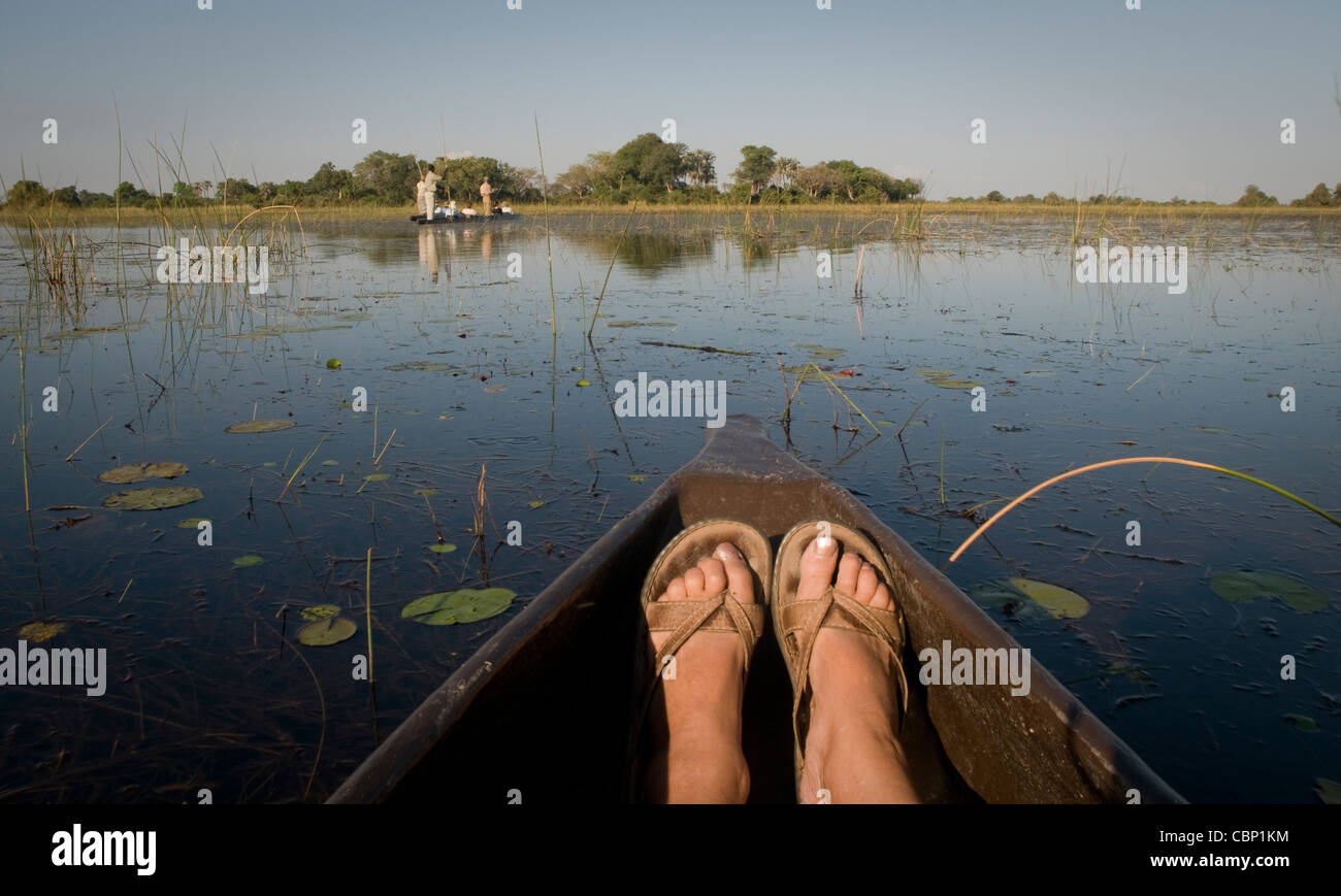 Africa Botswana Okavango Delta-Scenic with feet showing in Makoro Stock ...