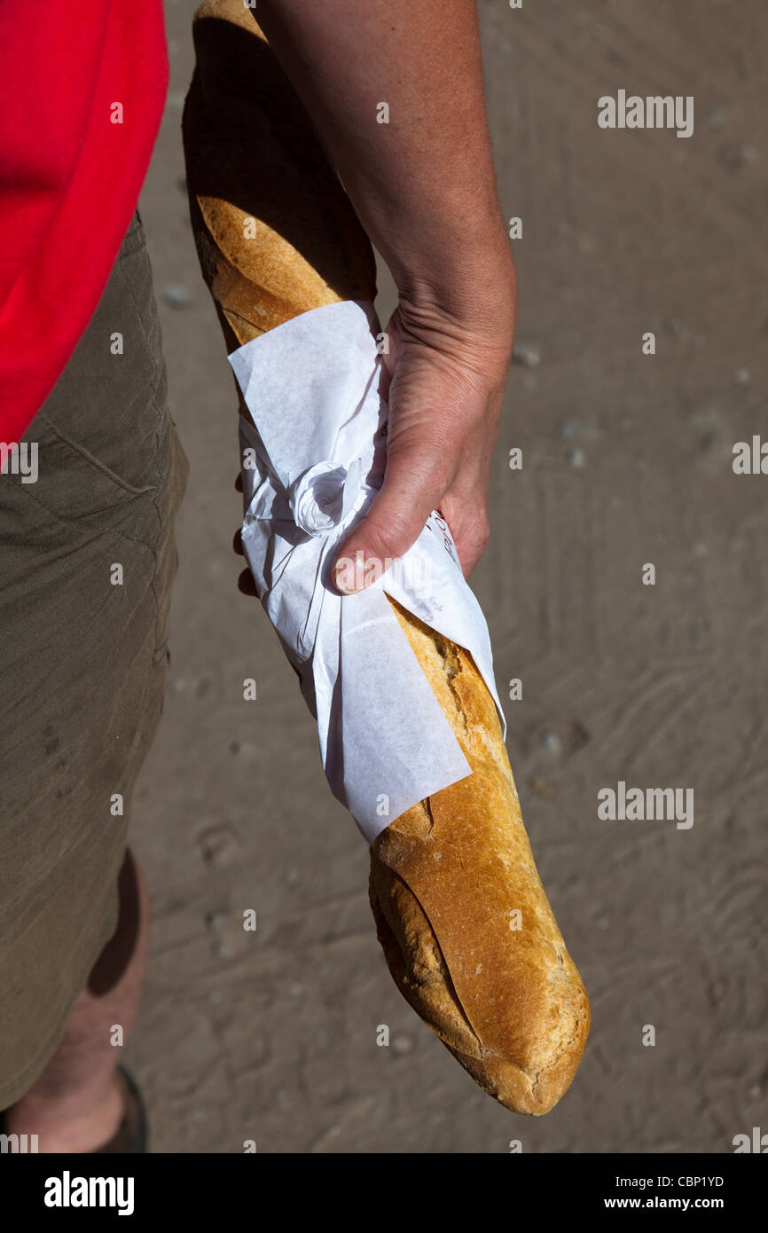Carrying bread hi-res stock photography and images - Alamy