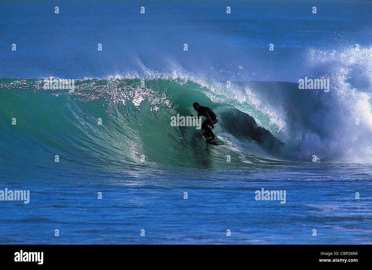 Surfer riding inside wave hi-res stock photography and images - Alamy
