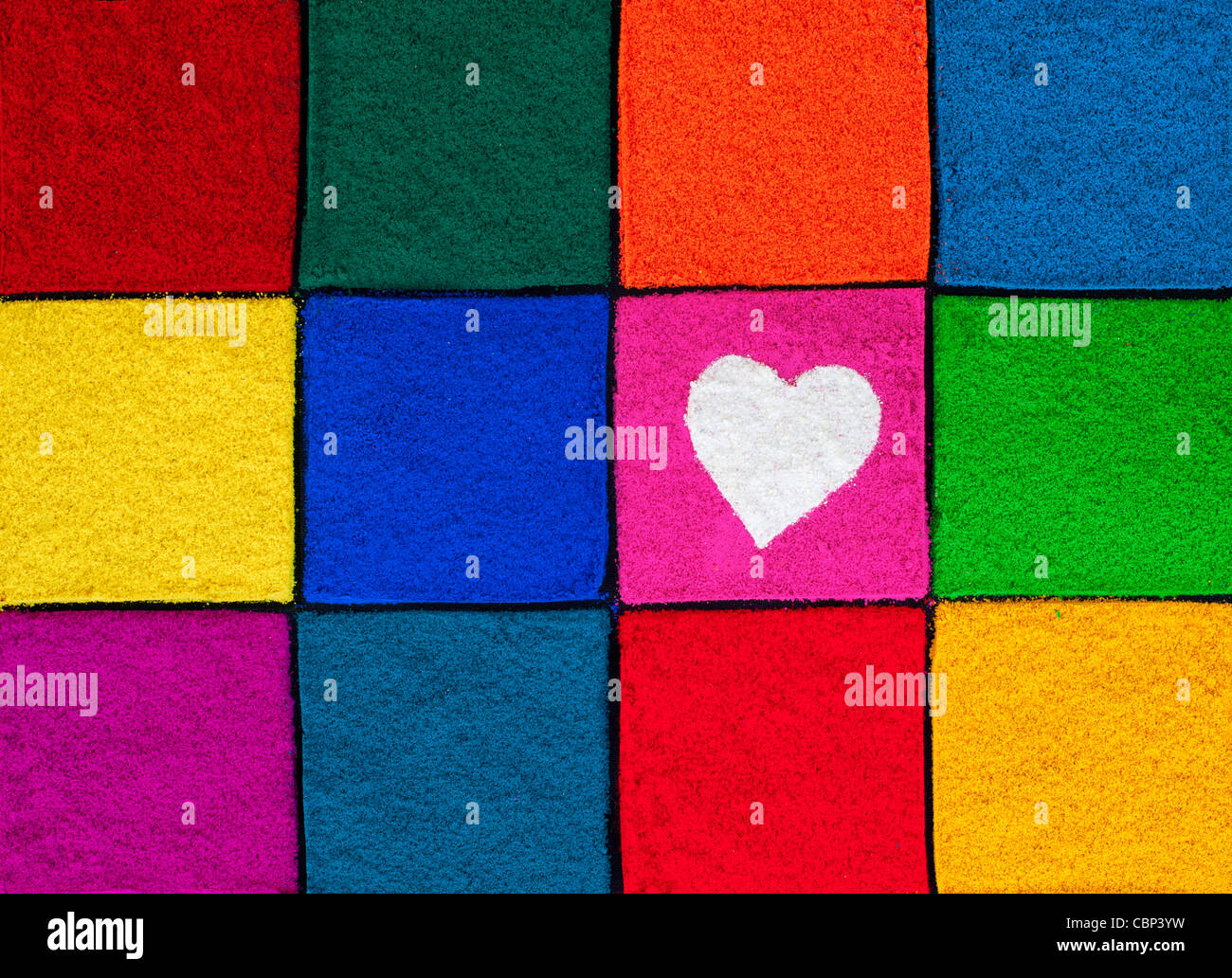 White heart shape on a coloured powder square pattern Stock Photo - Alamy