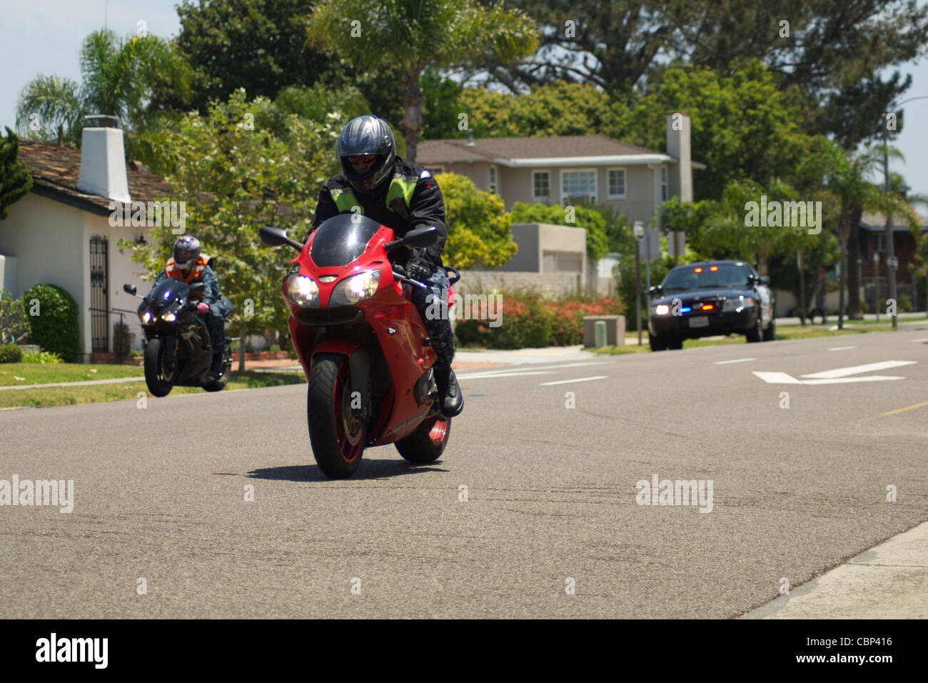 A member of the Coronado police department pursues two motorcycles ...