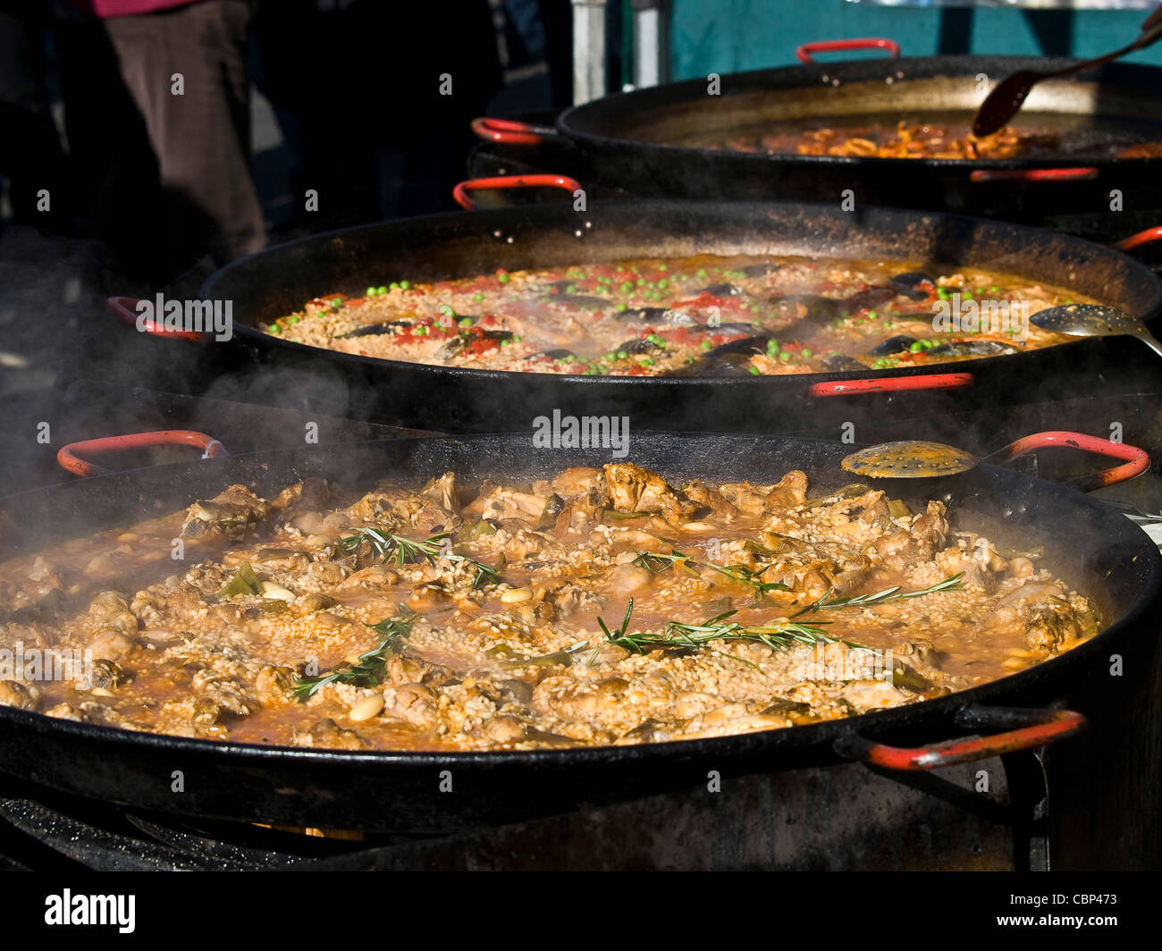 Rice in paella big pan hi-res stock photography and images - Alamy
