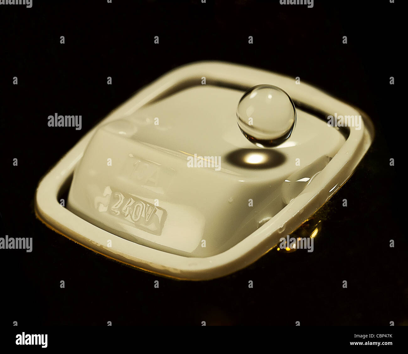 light switch with water splashing on it Stock Photo - Alamy