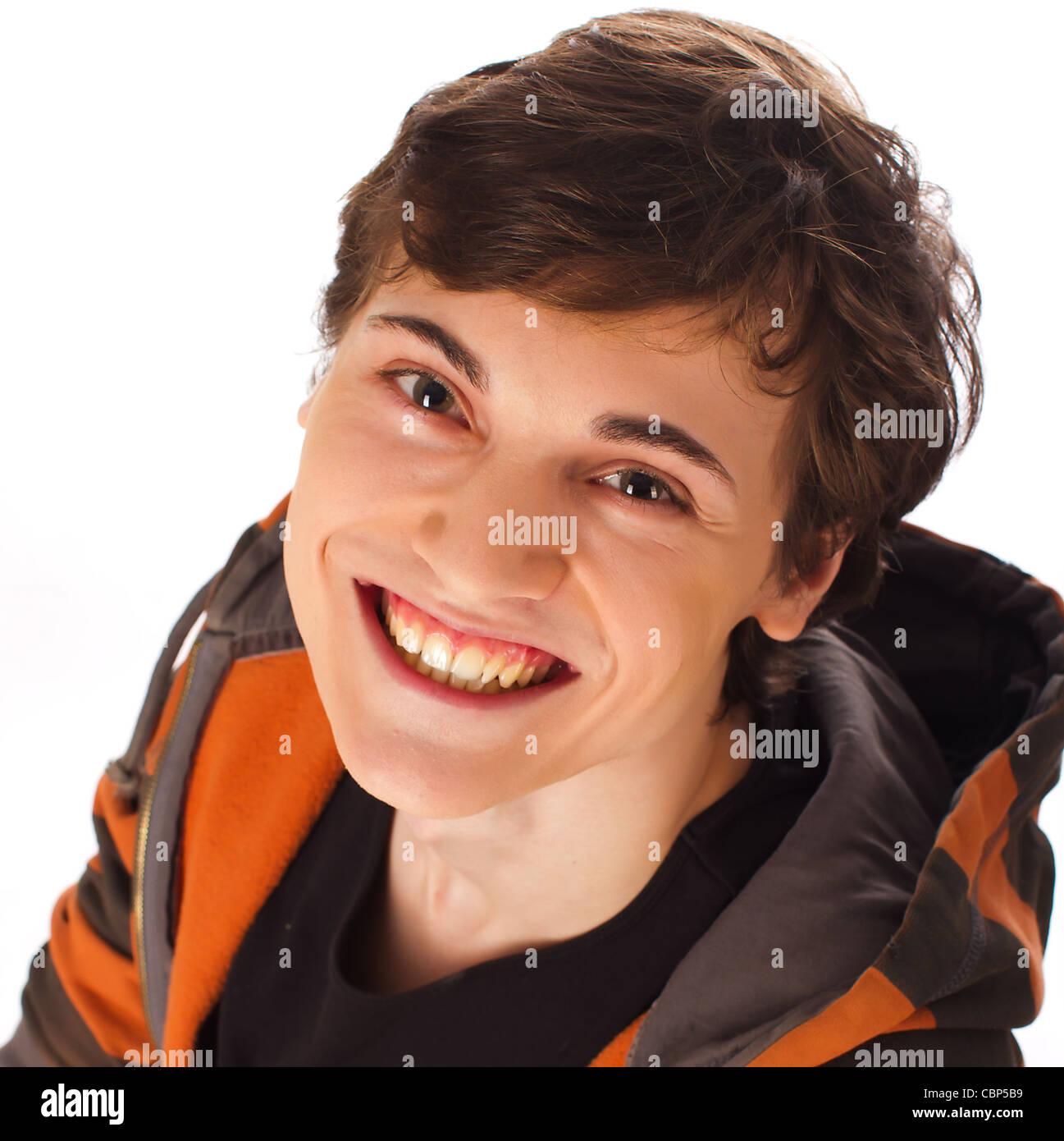 Happy young man looking up and smiling on white background Stock Photo ...