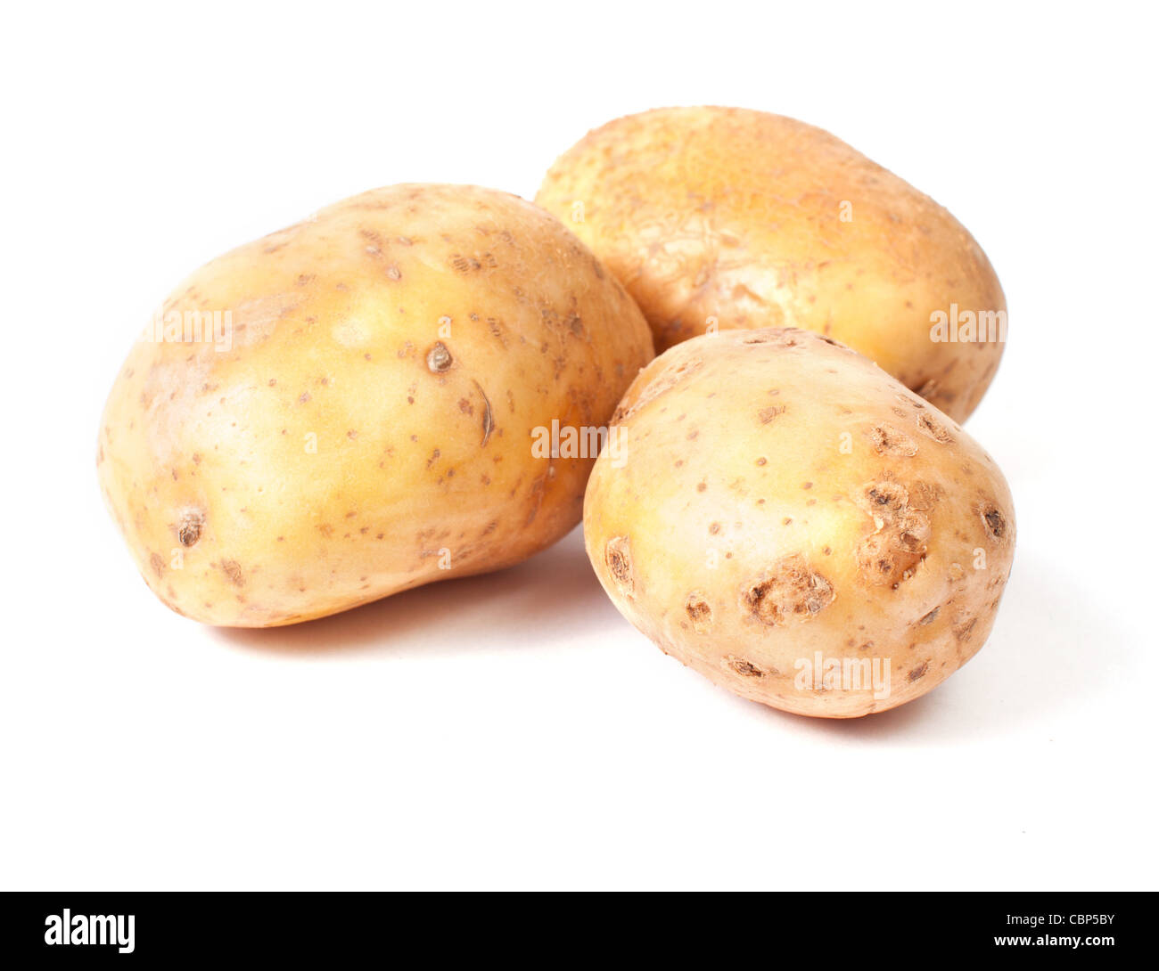 Yellow potato group isolated on white background Stock Photo - Alamy