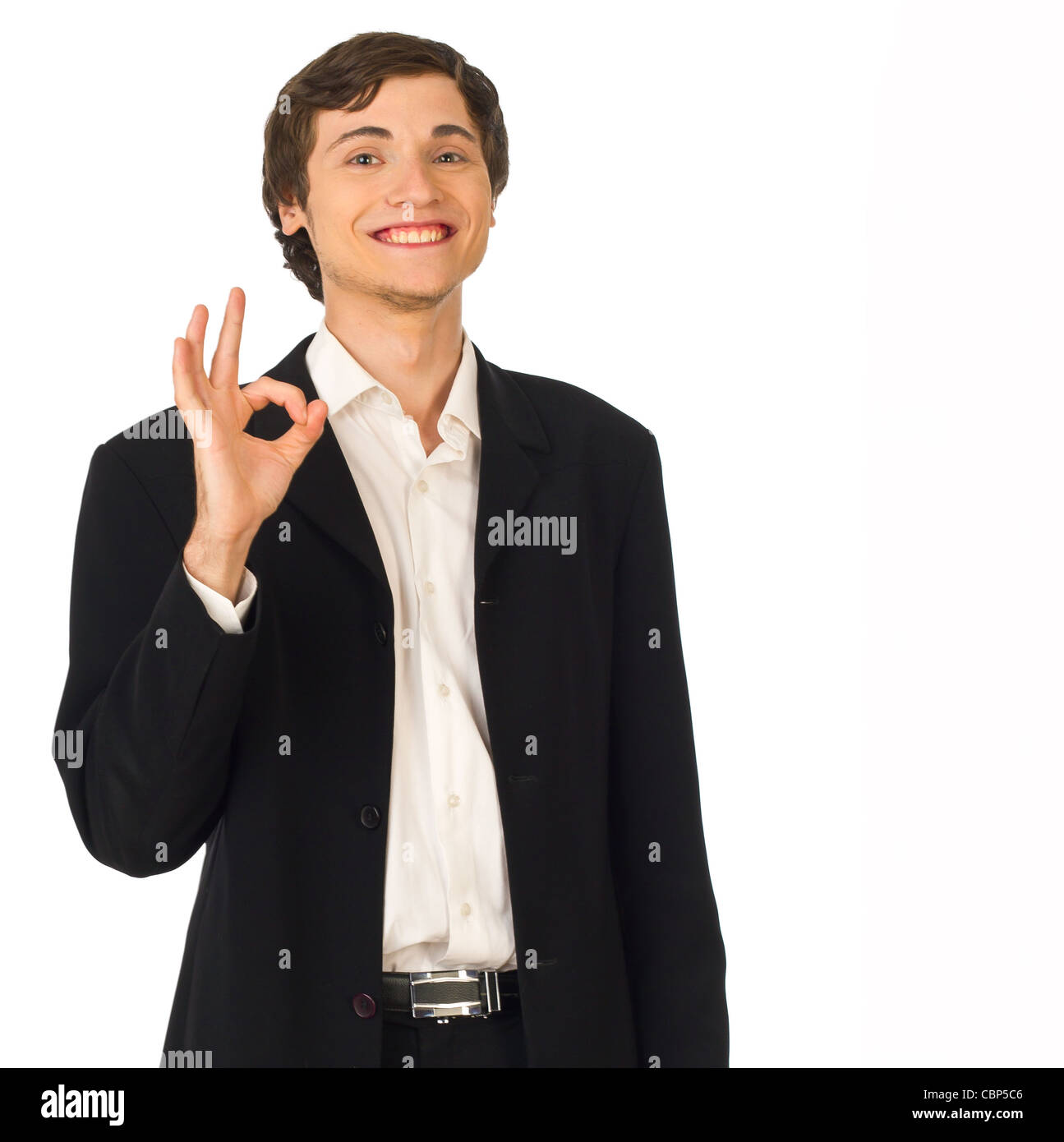 Young business man standing smiling and showing okay gesture on white ...