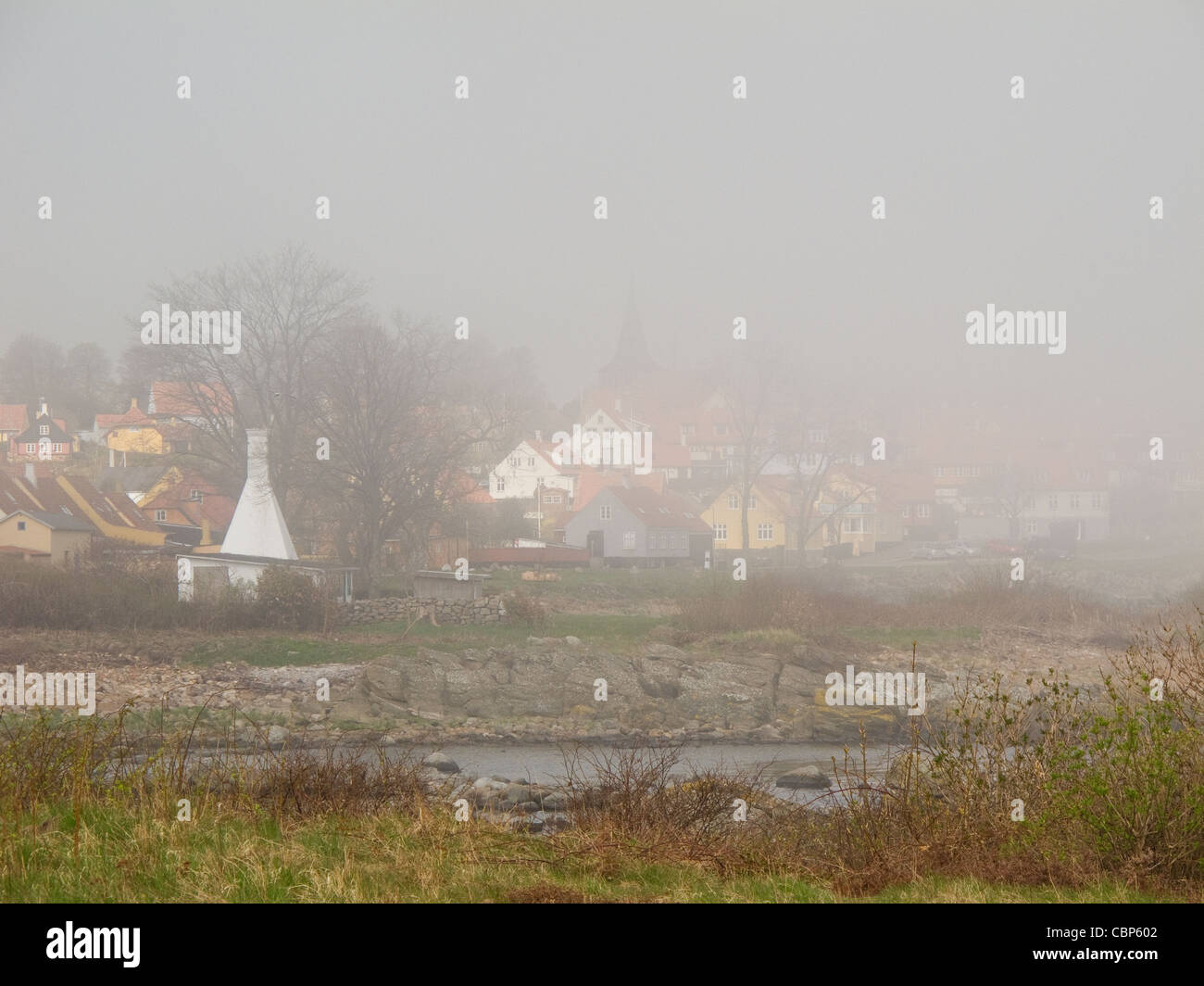 Svaneke on Bornholm in dense sea fog, Denmark Stock Photo - Alamy
